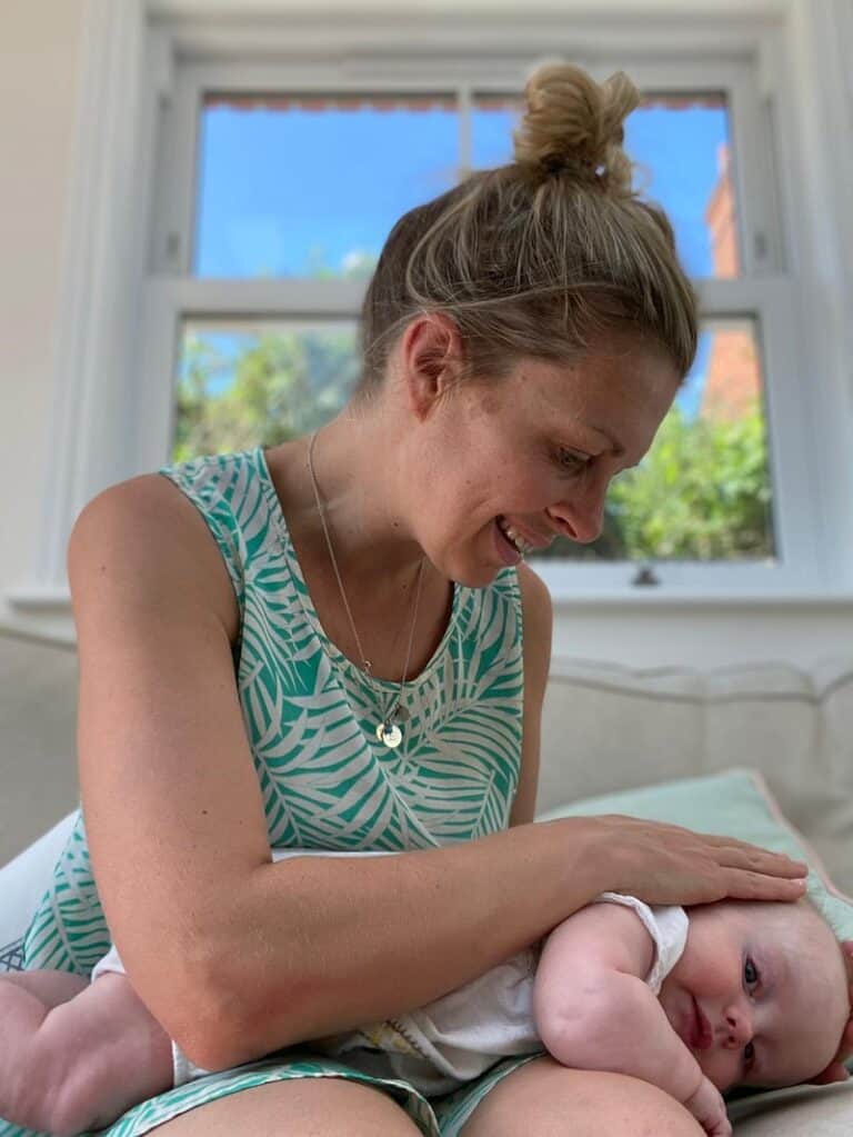 How to hold a newborn 9 easy ways, including how to hold a baby upright